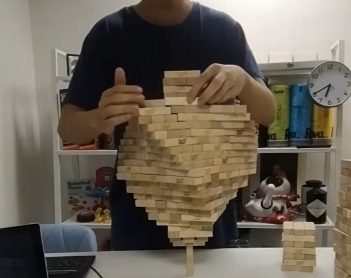 Guy Stacks Over 1,000 Jenga Blocks Onto a Single Vertical Block - https ...
