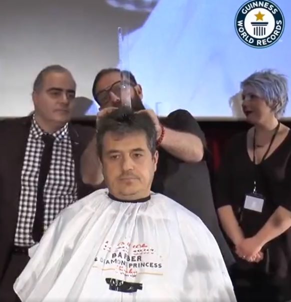 Watch a Greek Hairdresser Break World Record for Fastest Haircut ...